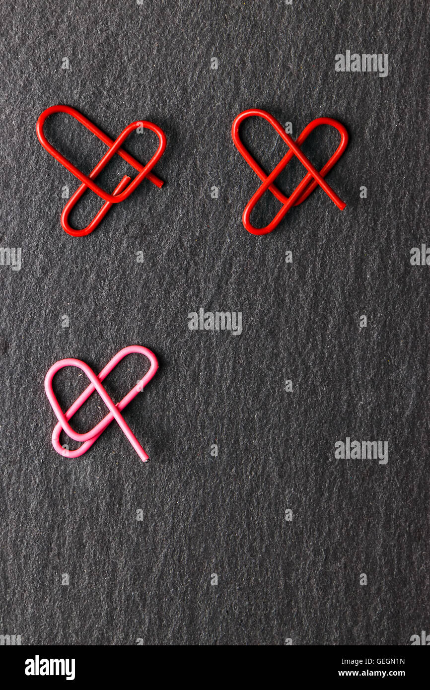 Color clips heart-shaped. Love concept for lovers Stock Photo - Alamy