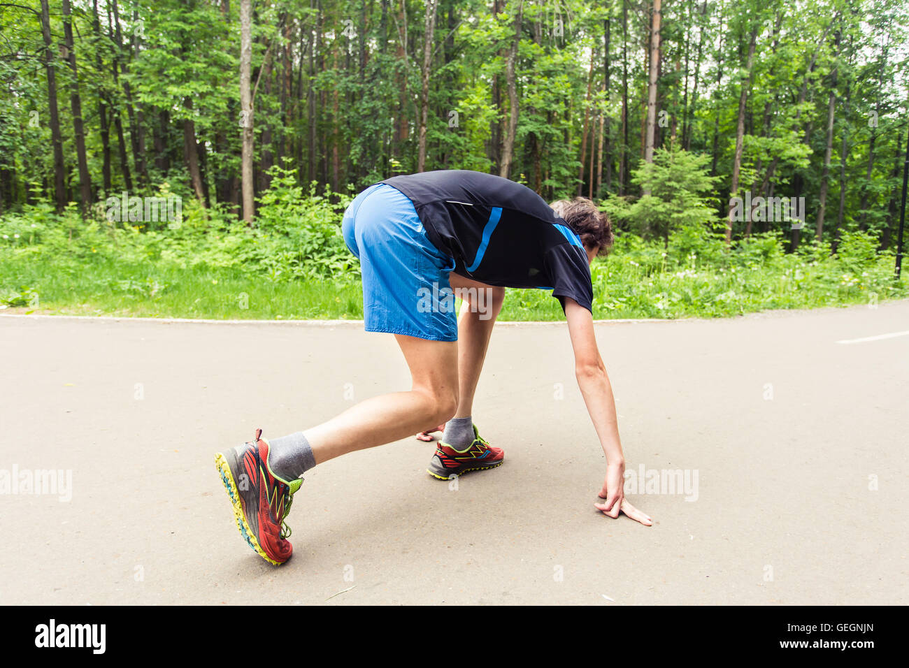 Man ready to start running Stock Photo - Alamy