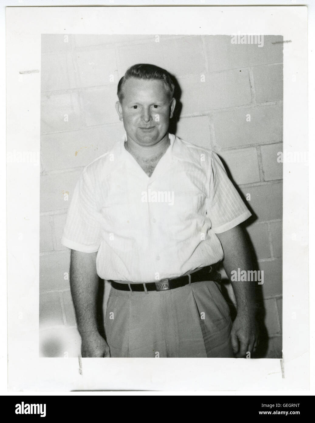 A photograph of a cooperative farmer, likely from a rural American area ...