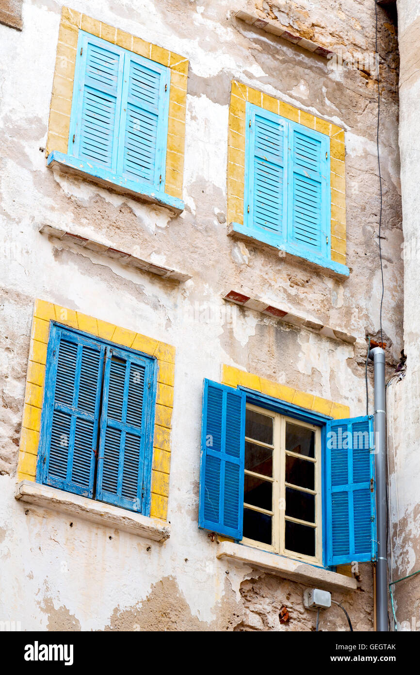blue window in morocco africa old construction and brown wall ...