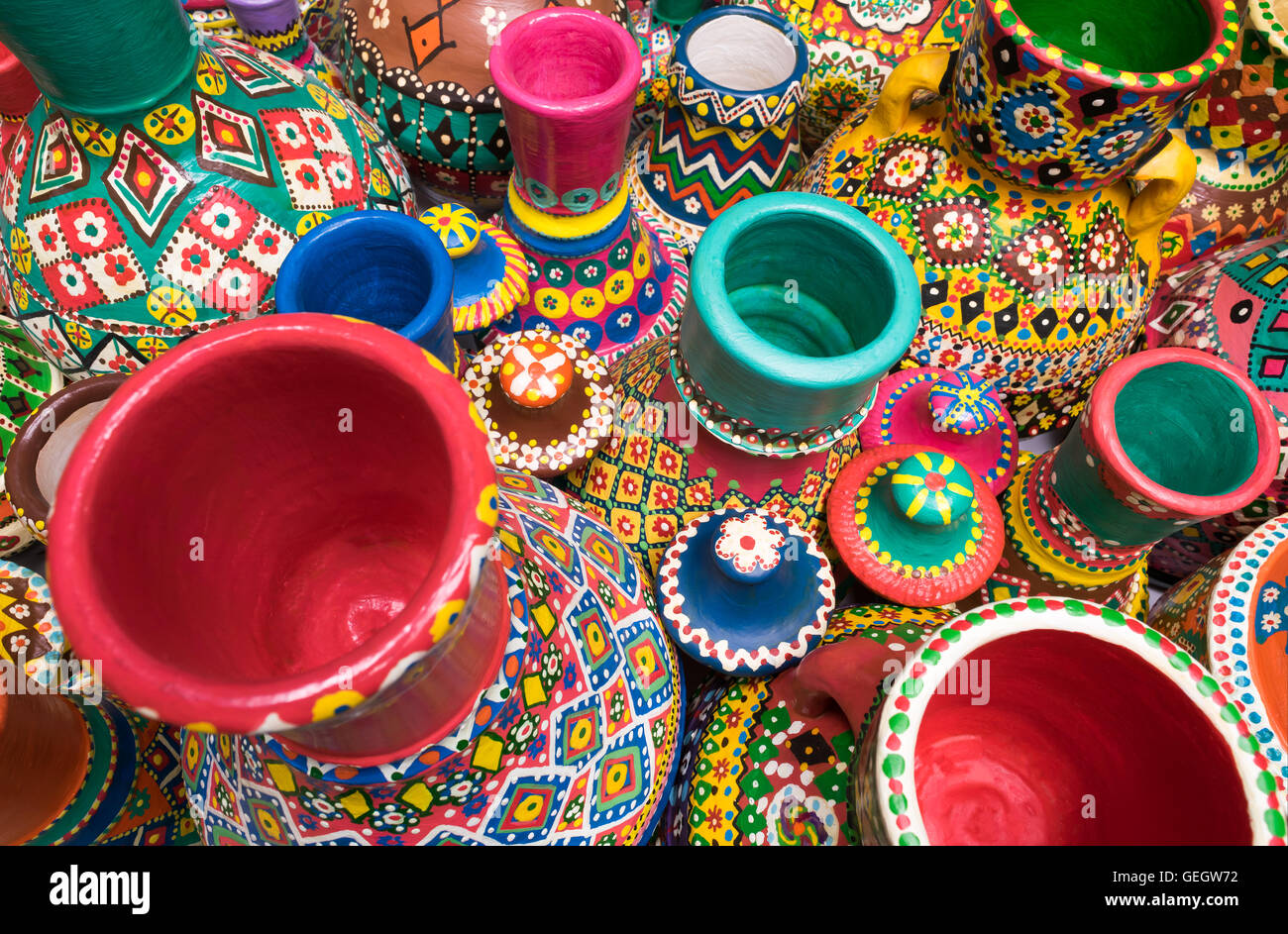 Angled view showing a composition of artistic painted handcrafted ...