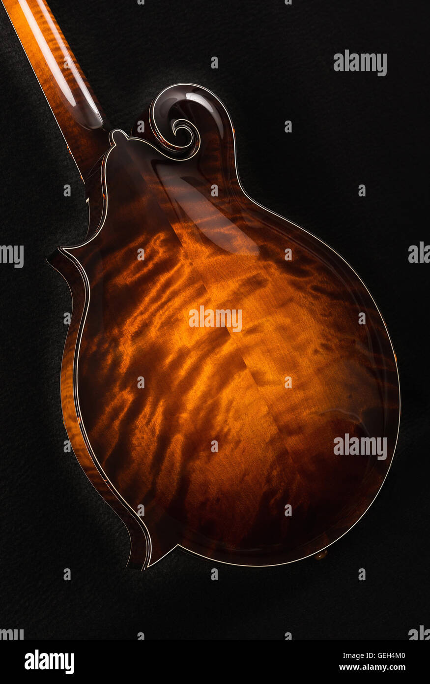 Mandolin isolated on black background Stock Photo - Alamy