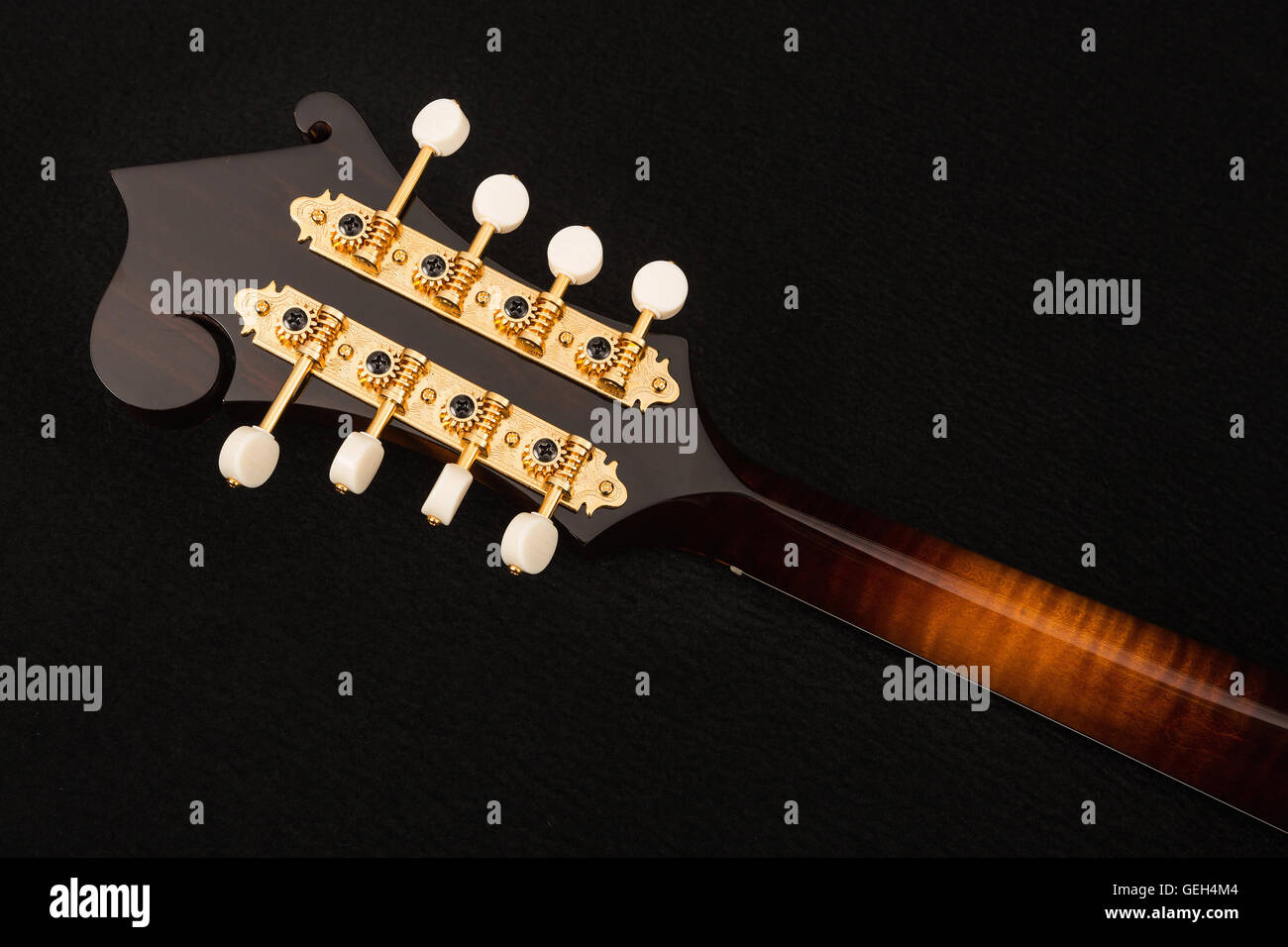 Mandolin isolated on black background Stock Photo - Alamy
