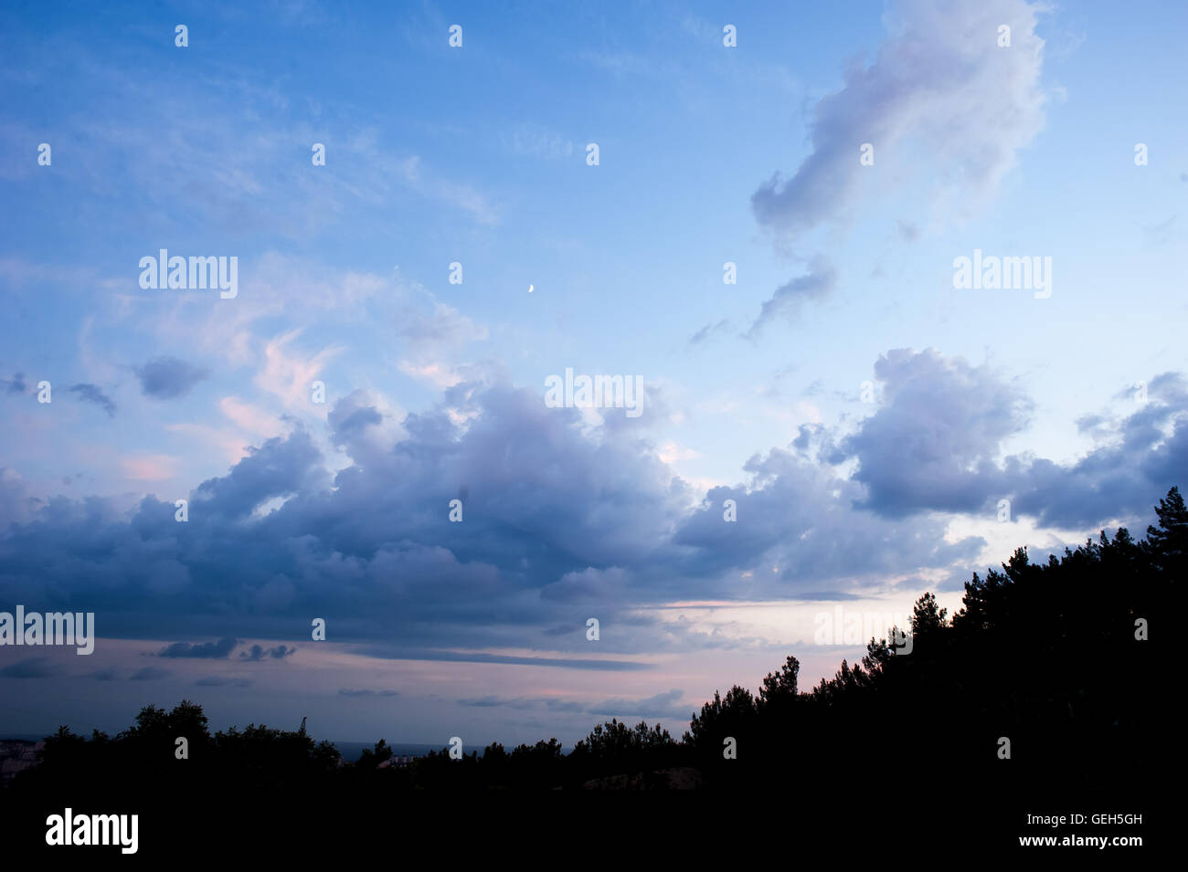blue sky, the moon, beautiful clouds Sunset Stock Photo - Alamy