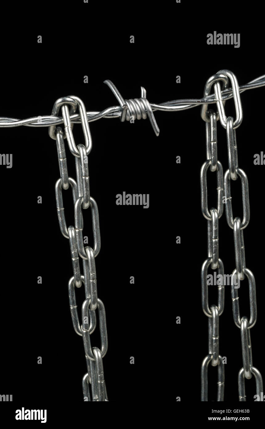 Barbed wire and chain, a human rights and immigration concept Stock ...