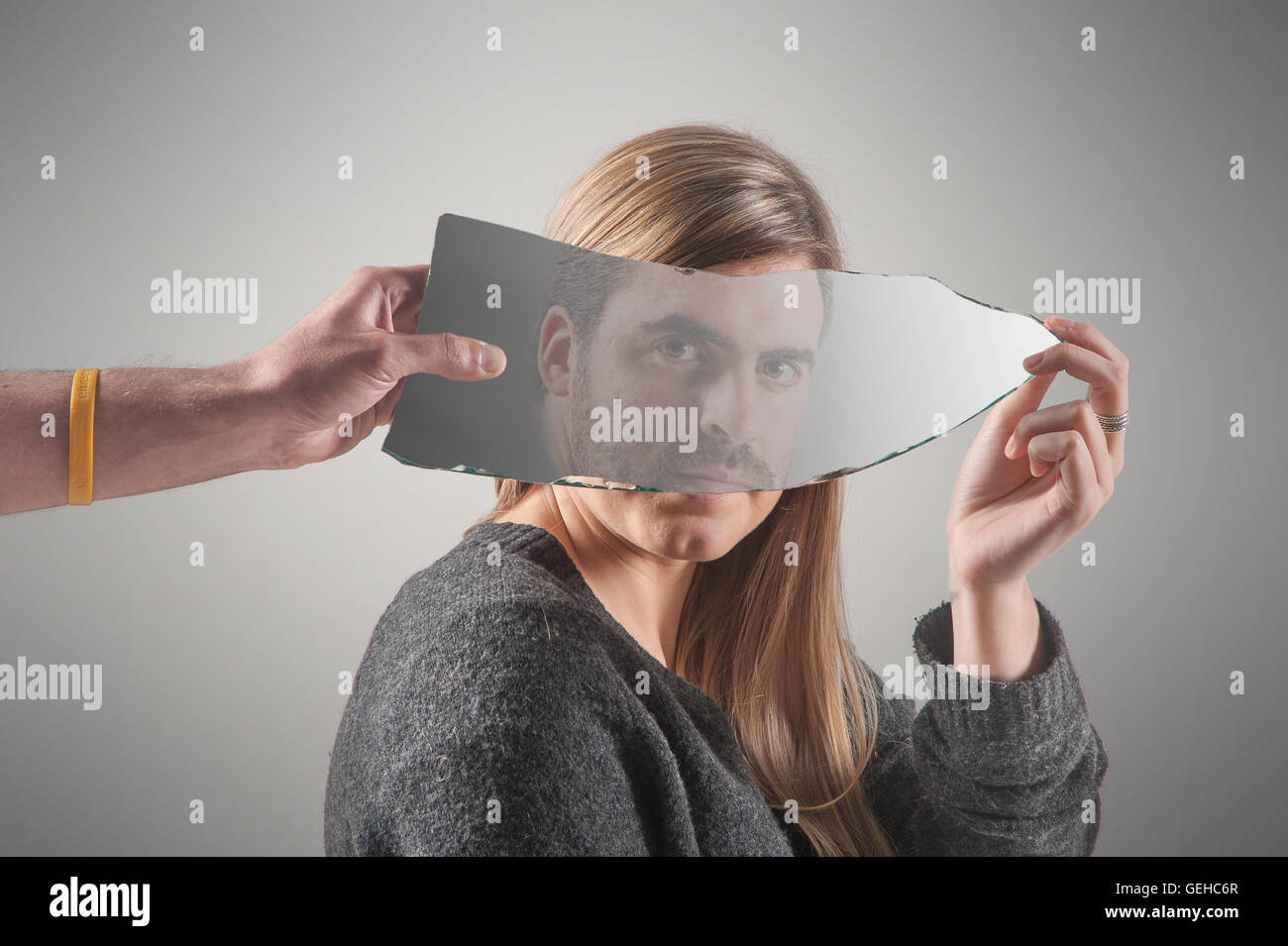 Mirror reflection bizarre joint faces hi-res stock photography and ...