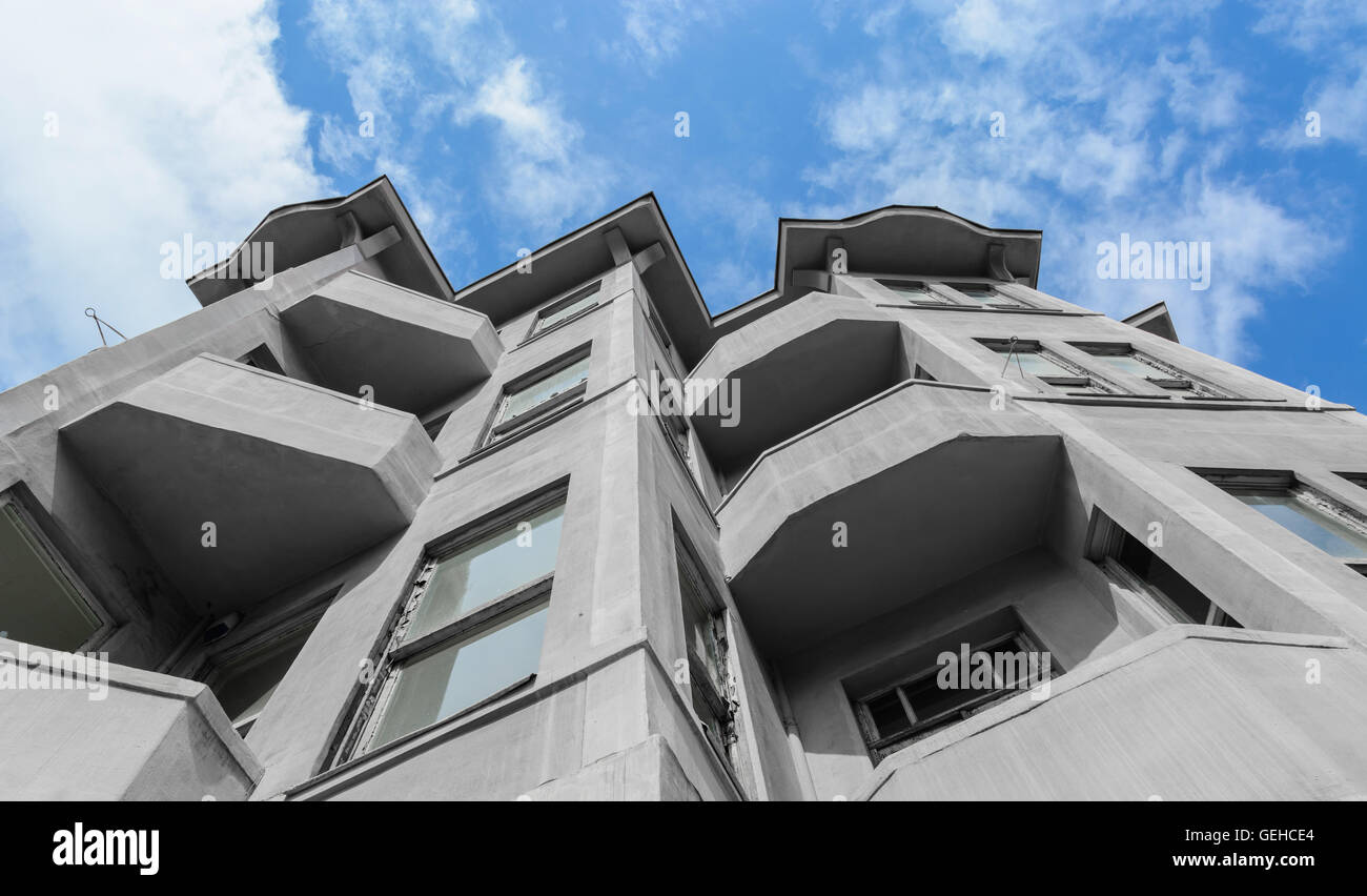 Vintage High building on a background of clouds Stock Photo - Alamy