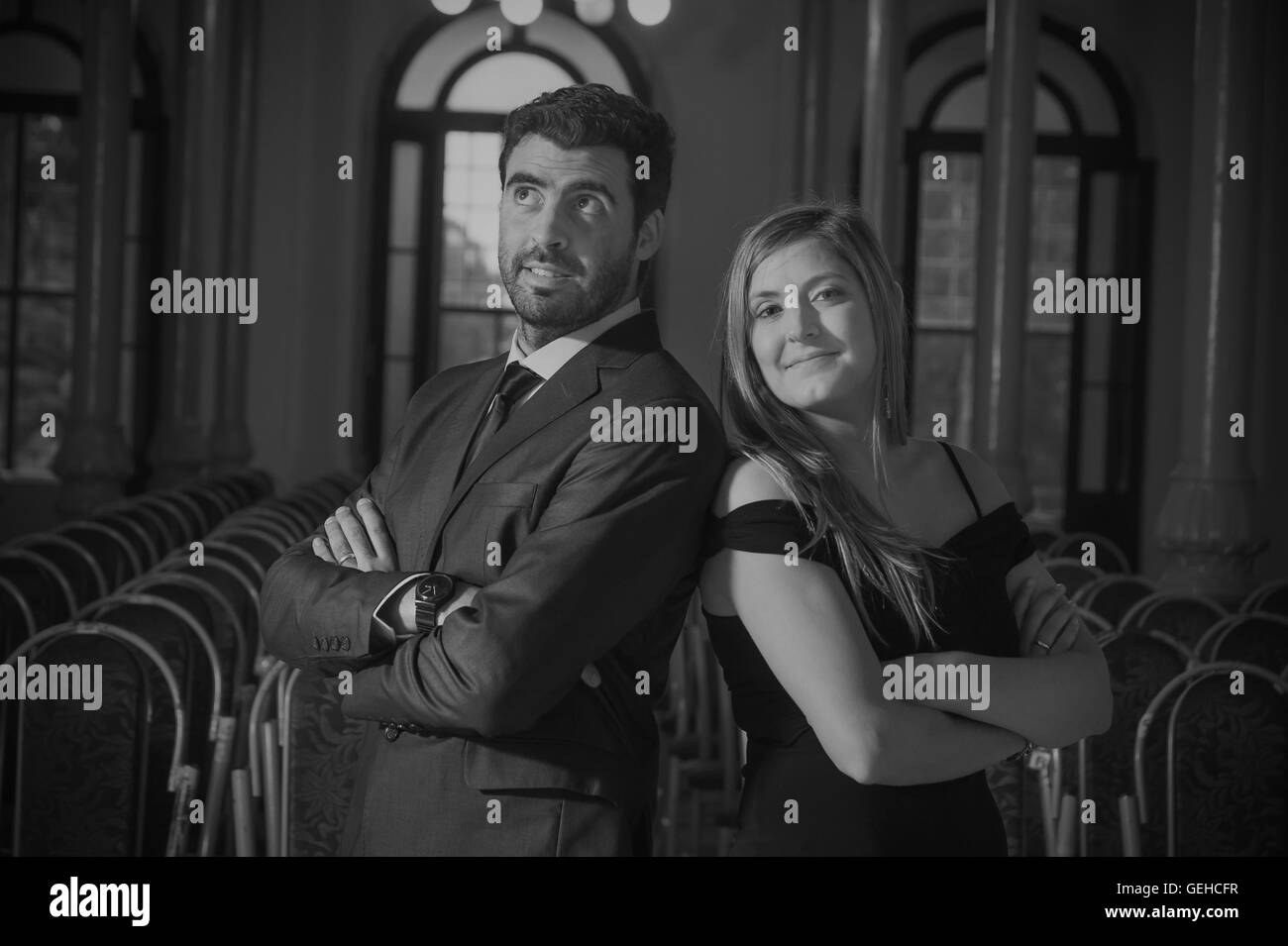 Happy couple crossed arms pose Black and White Stock Photos & Images ...