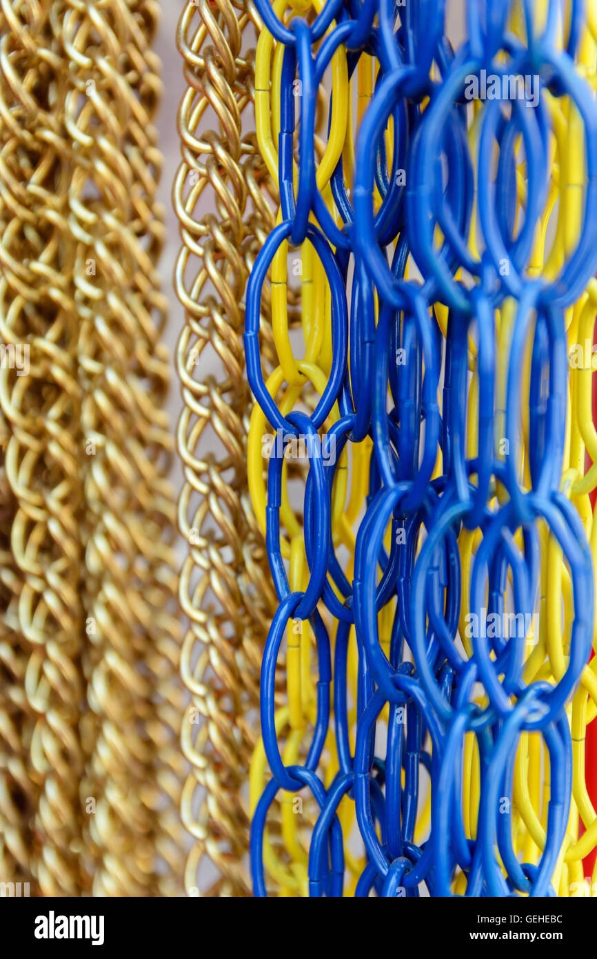Bright colored wires chains decorative background Stock Photo - Alamy