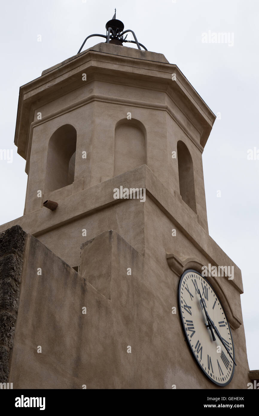 The door of the port of Hercules with the clock tower Stock Photo - Alamy