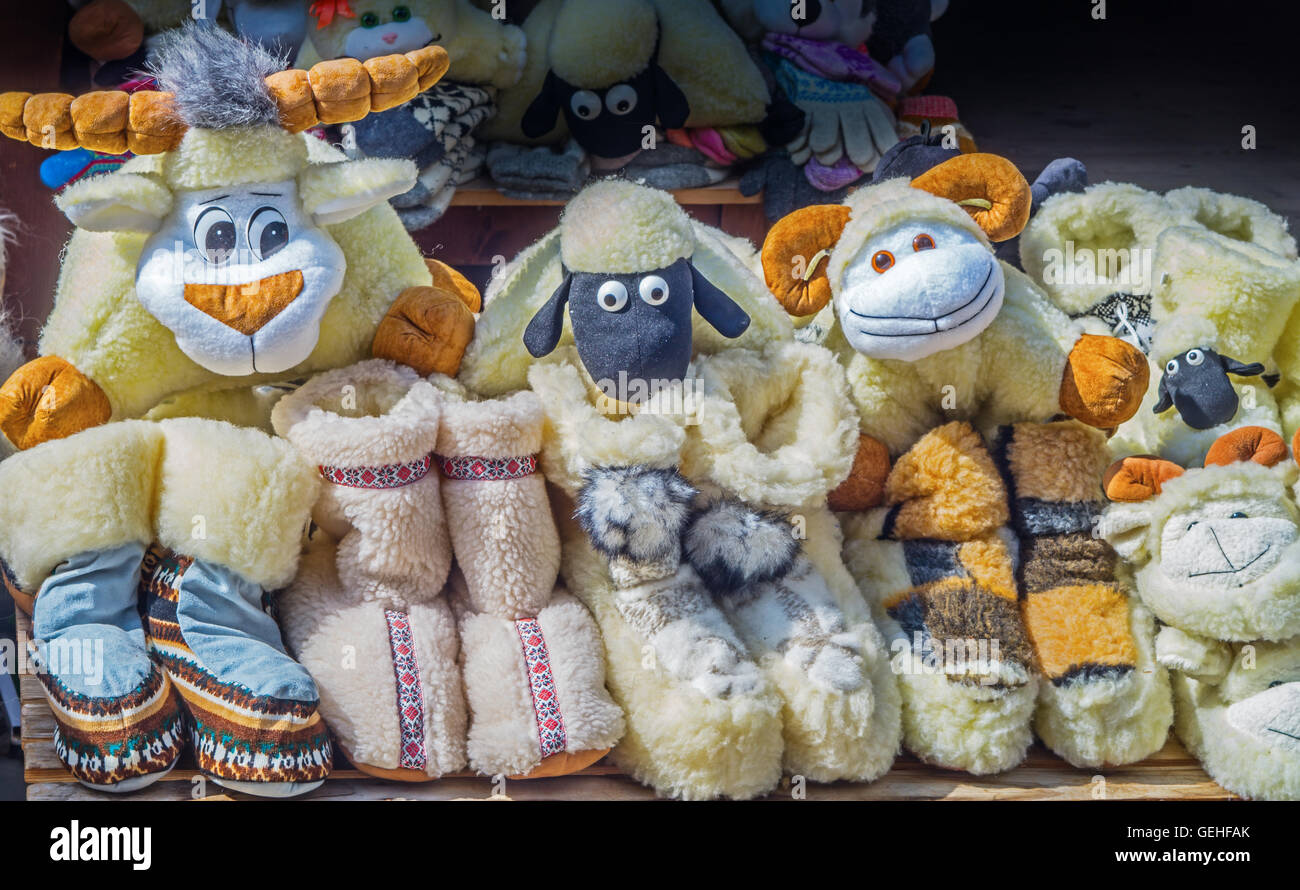 Hand made of footwear made of leather sheep Stock Photo - Alamy