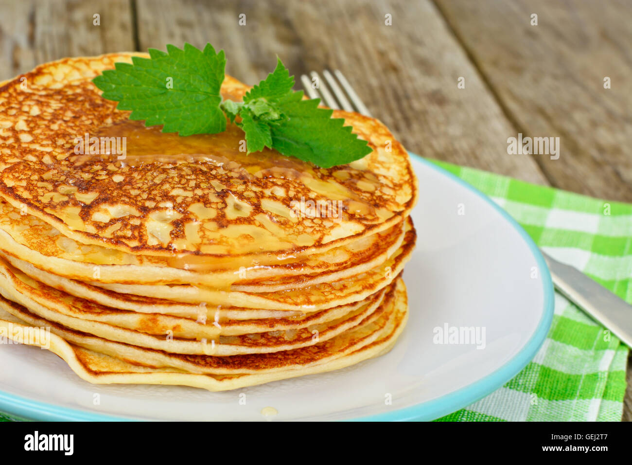 Tasty Pancakes Stack with Honey Stock Photo - Alamy