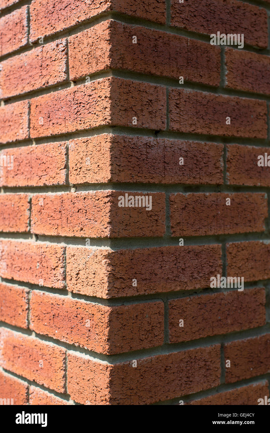 Corner of a red brick wall in the sunshine and shade Stock Photo - Alamy
