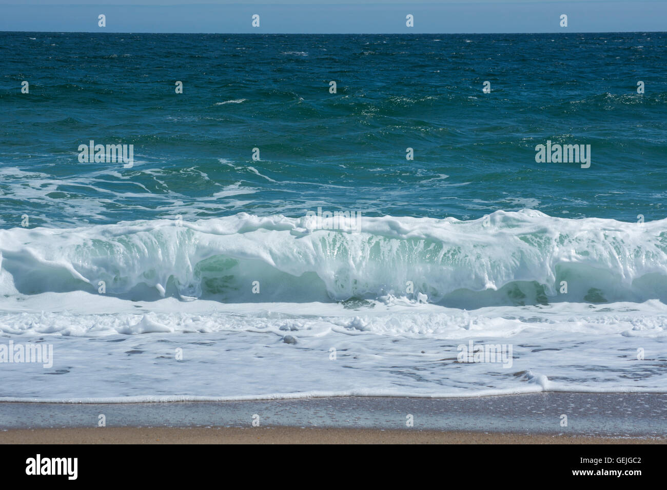 Ocean wave in motion Stock Photo - Alamy