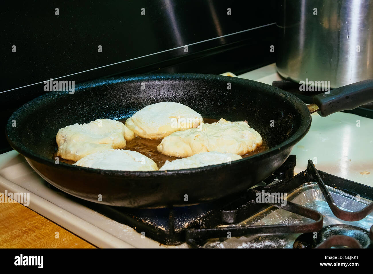 cooking deep fried meat pies Stock Photo - Alamy