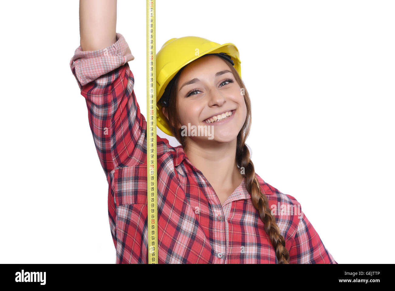 Close up of beautiful woman construction worker taking measures with a ...