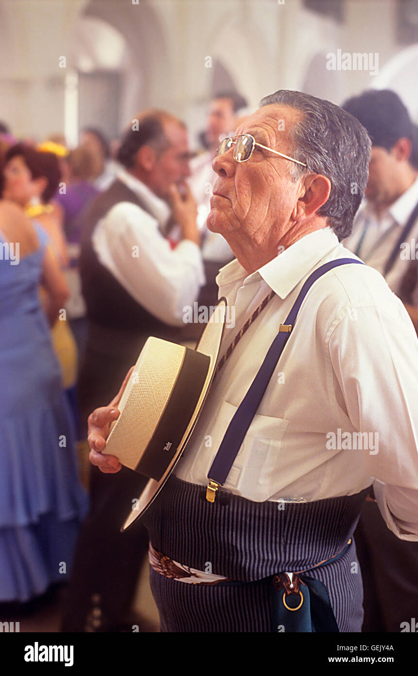 El Rocío Romería pilgrimage ,`Romero´Pilgrim praying in front of the ...