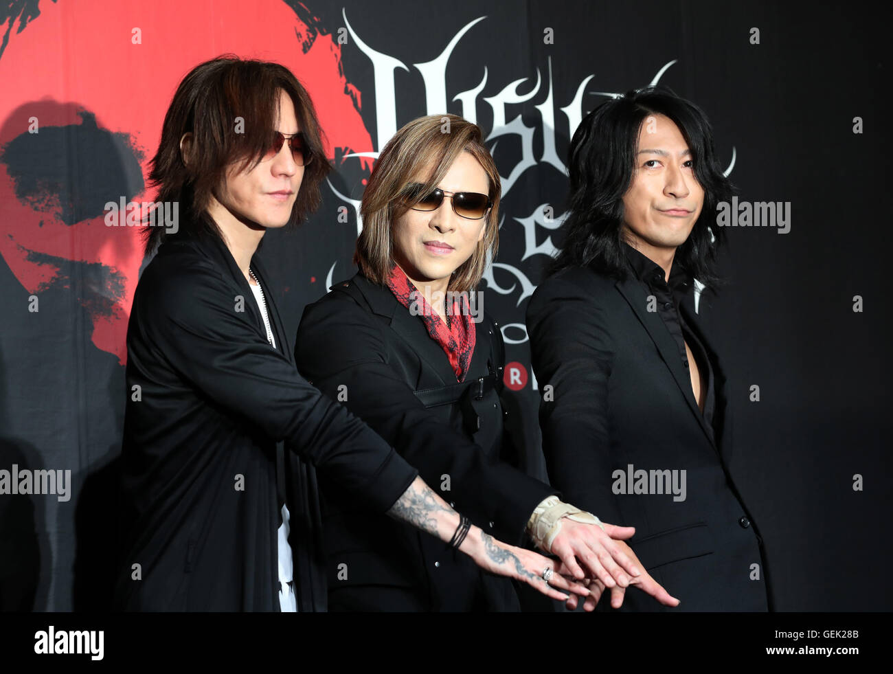 Tokyo, Japan. 25th July, 2016. Japanese visual-type rock singers Sugizo (L) of Luna Sea, Yoshiki ...