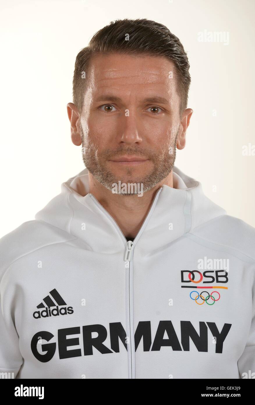 Jan Kerler poses at a photocall during the preparations for the Olympic ...
