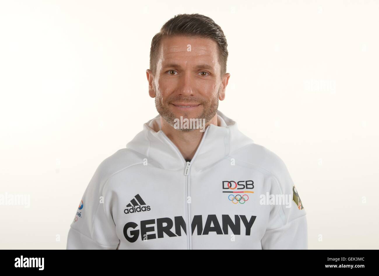 Jan Kerler poses at a photocall during the preparations for the Olympic ...