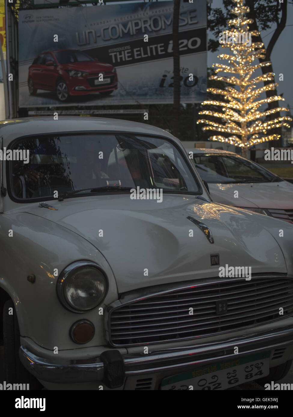 Bangalore, Karnataka, India. 19th Dec, 2014. Man driving old Ambassador ...