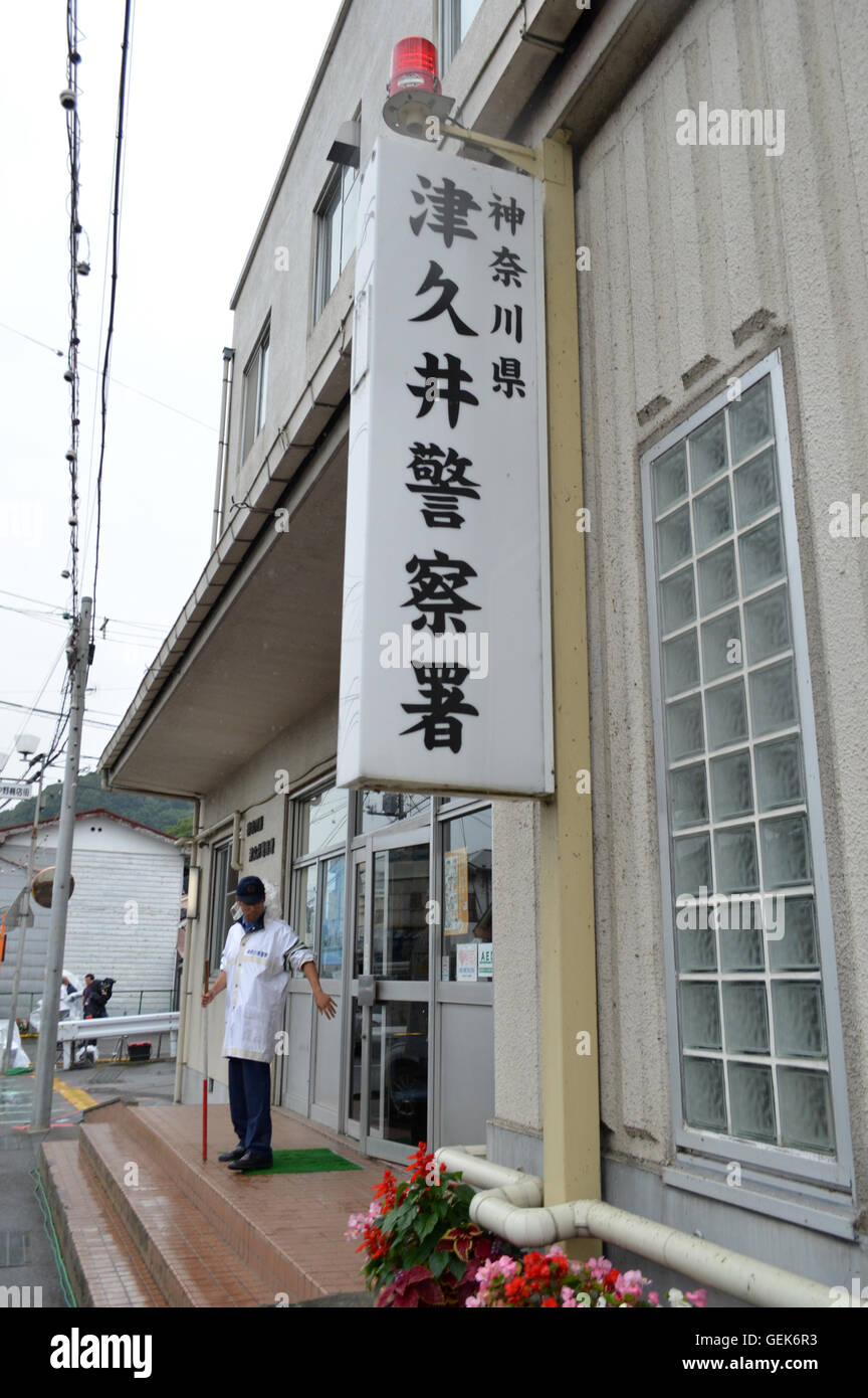 Tokyo, Japan. 26th July, 2016. A Japanese police officer stands in ...