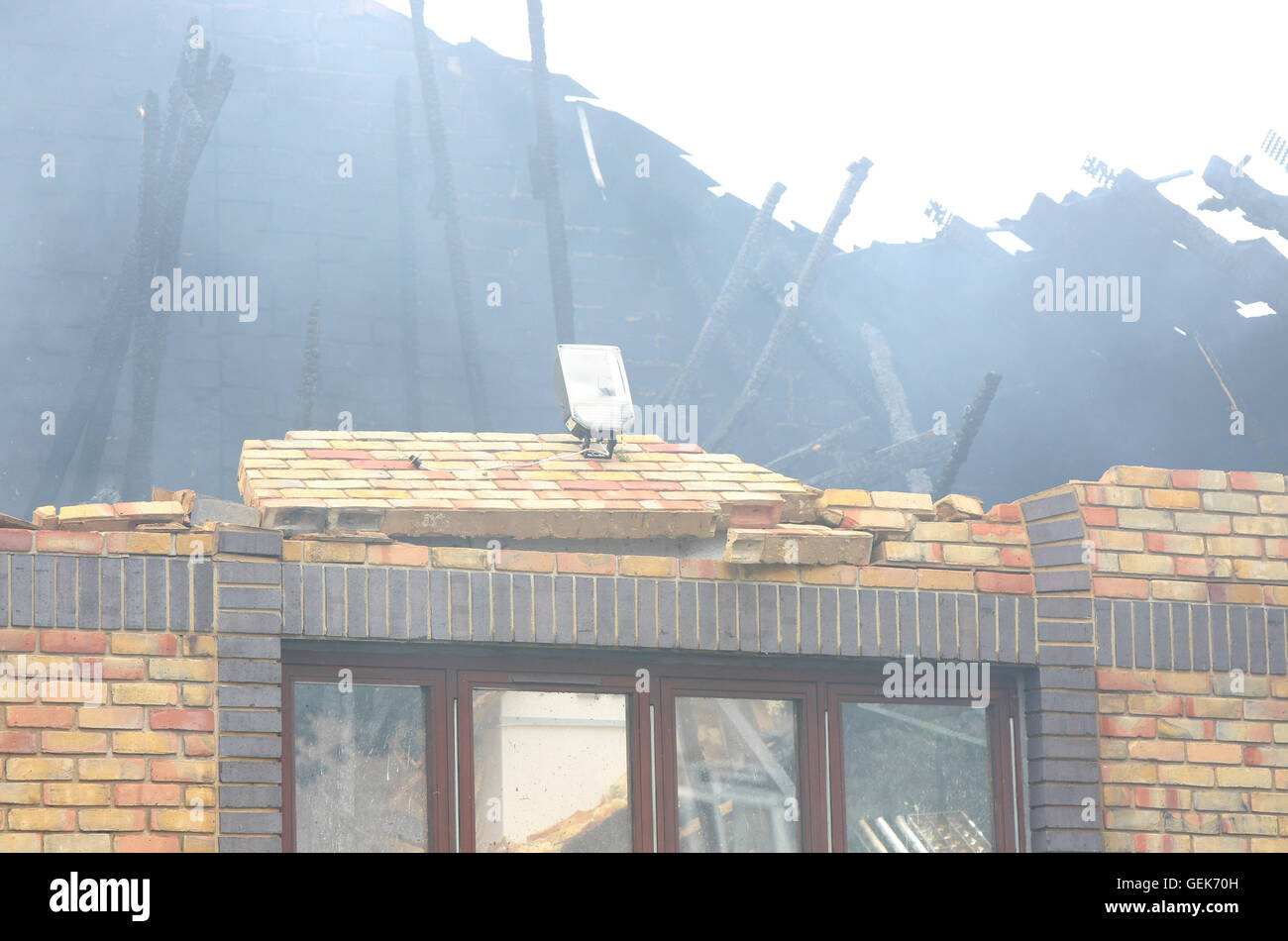 Bordon, Hampshire, UK. 26th July, 2016. More than 50 firefighters are ...