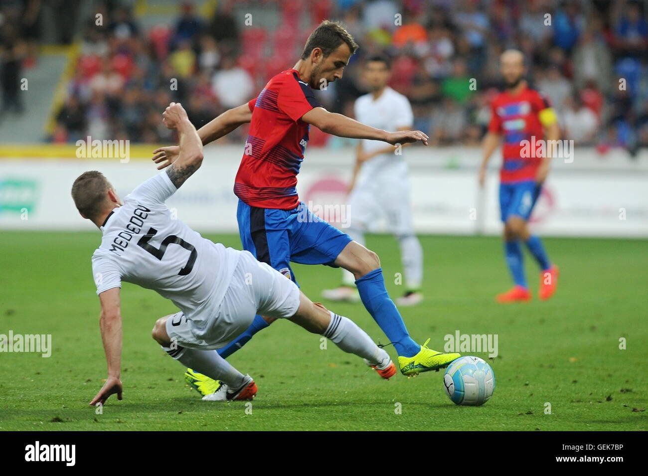 Pilsen, Czech Republic. 26th July, 2016. Maxim Medvedev of Karabach, left, and Tomas Horava of ...