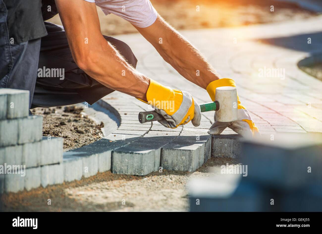 Garden Brick Pathway Paving by Professional Paver Worker Stock Photo ...