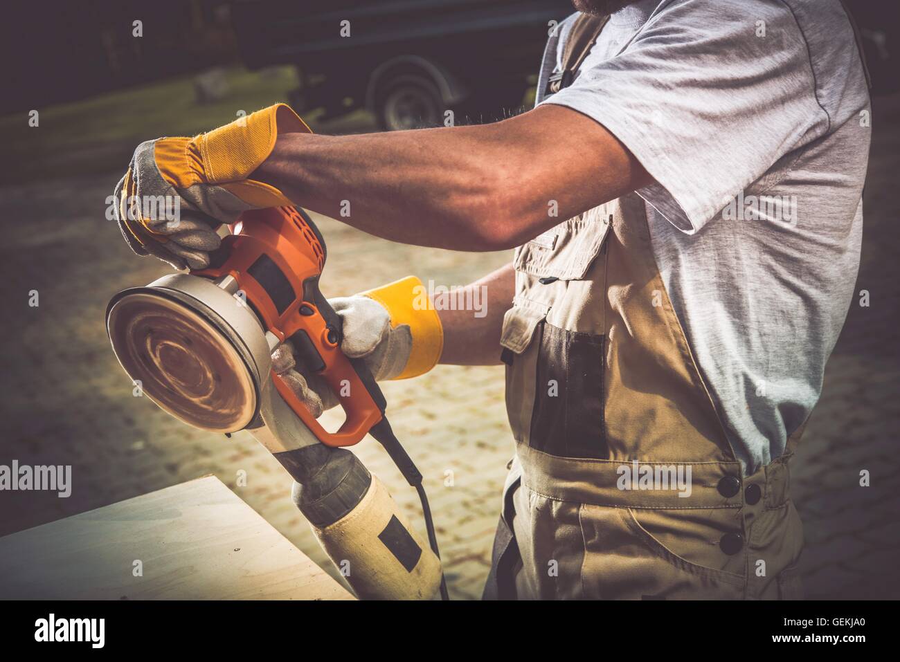 Sanding Machine In Action. Wood Sanding Closeup Photo. Men with Sanding ...