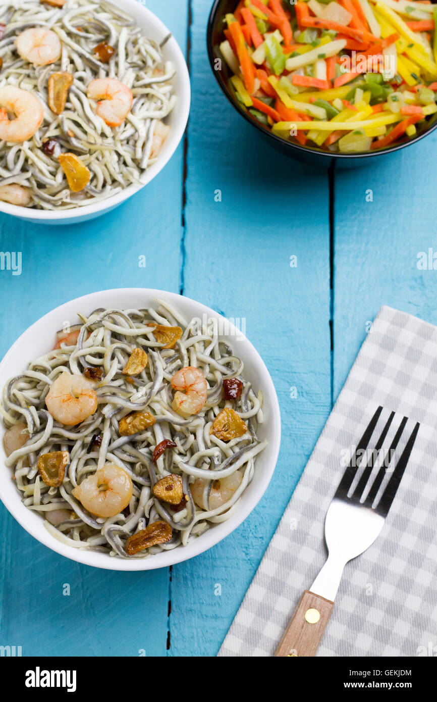 Surimi elvers with prawns, garlic and pepper Stock Photo - Alamy