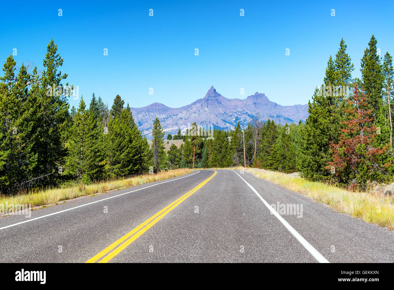 Road leading to Yellowstone National Park with dramatic views of the ...