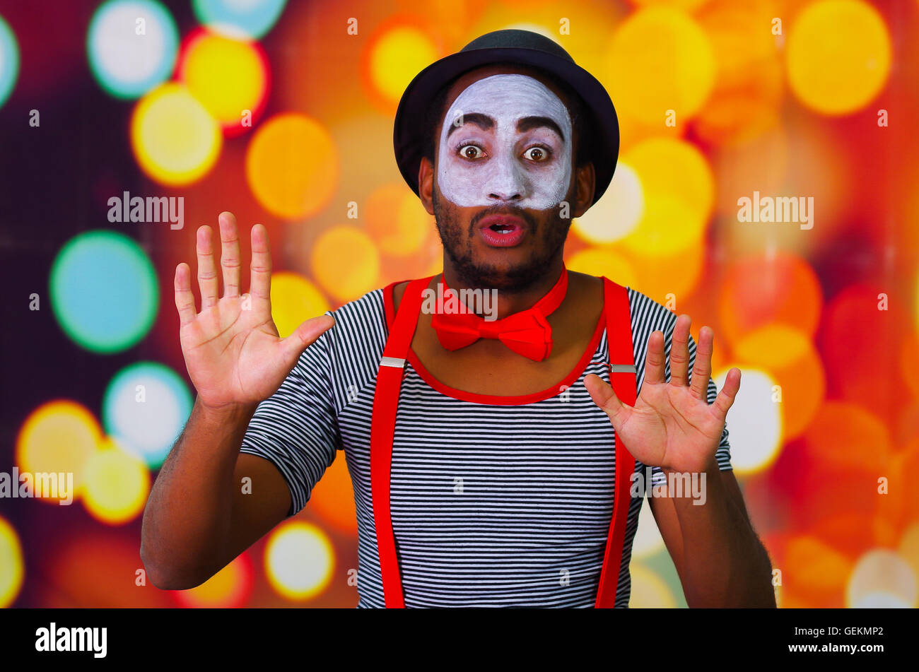 Pantomime man with facial paint posing for camera interacting funny ...