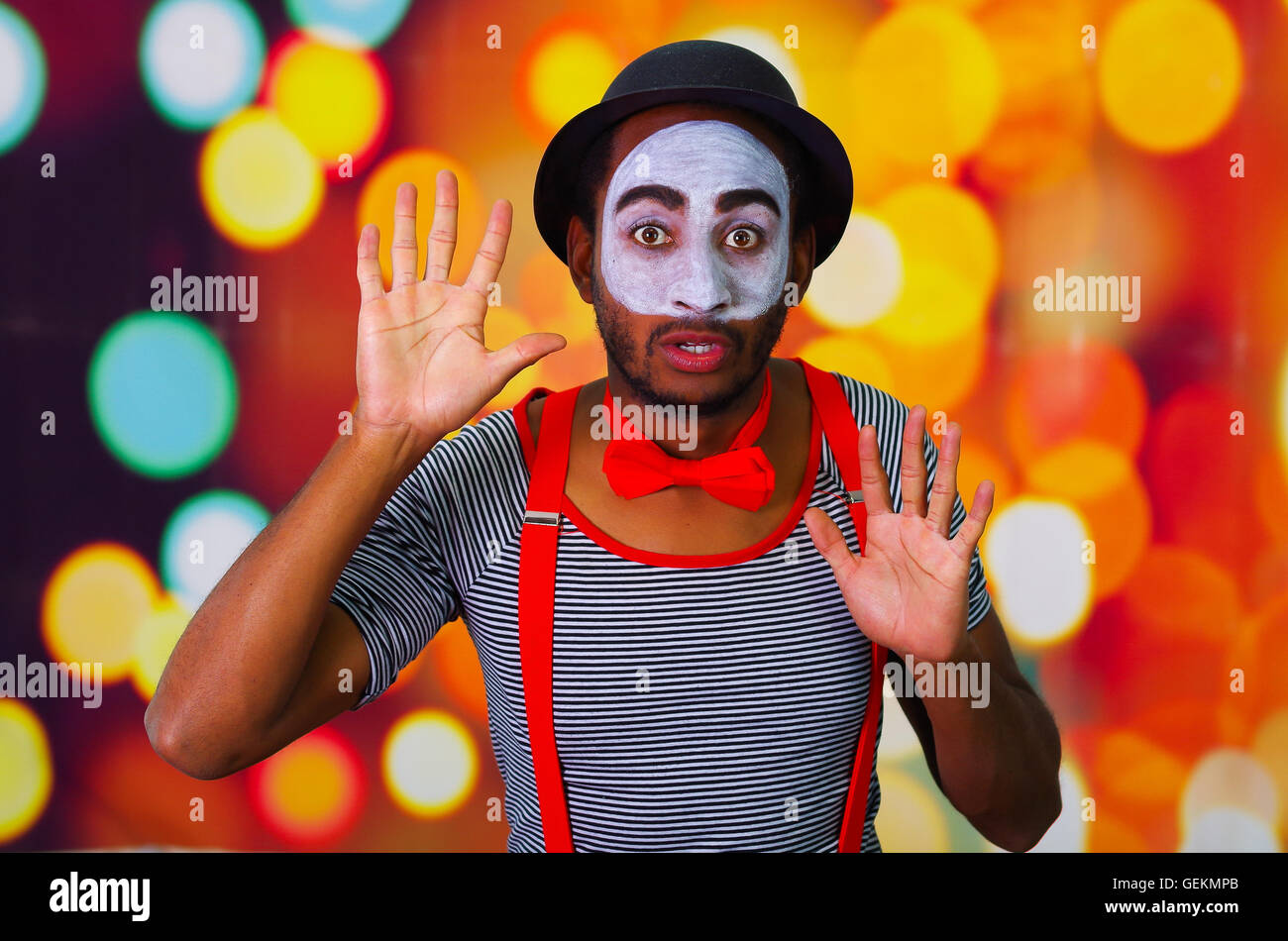 Pantomime man with facial paint posing for camera interacting funny ...