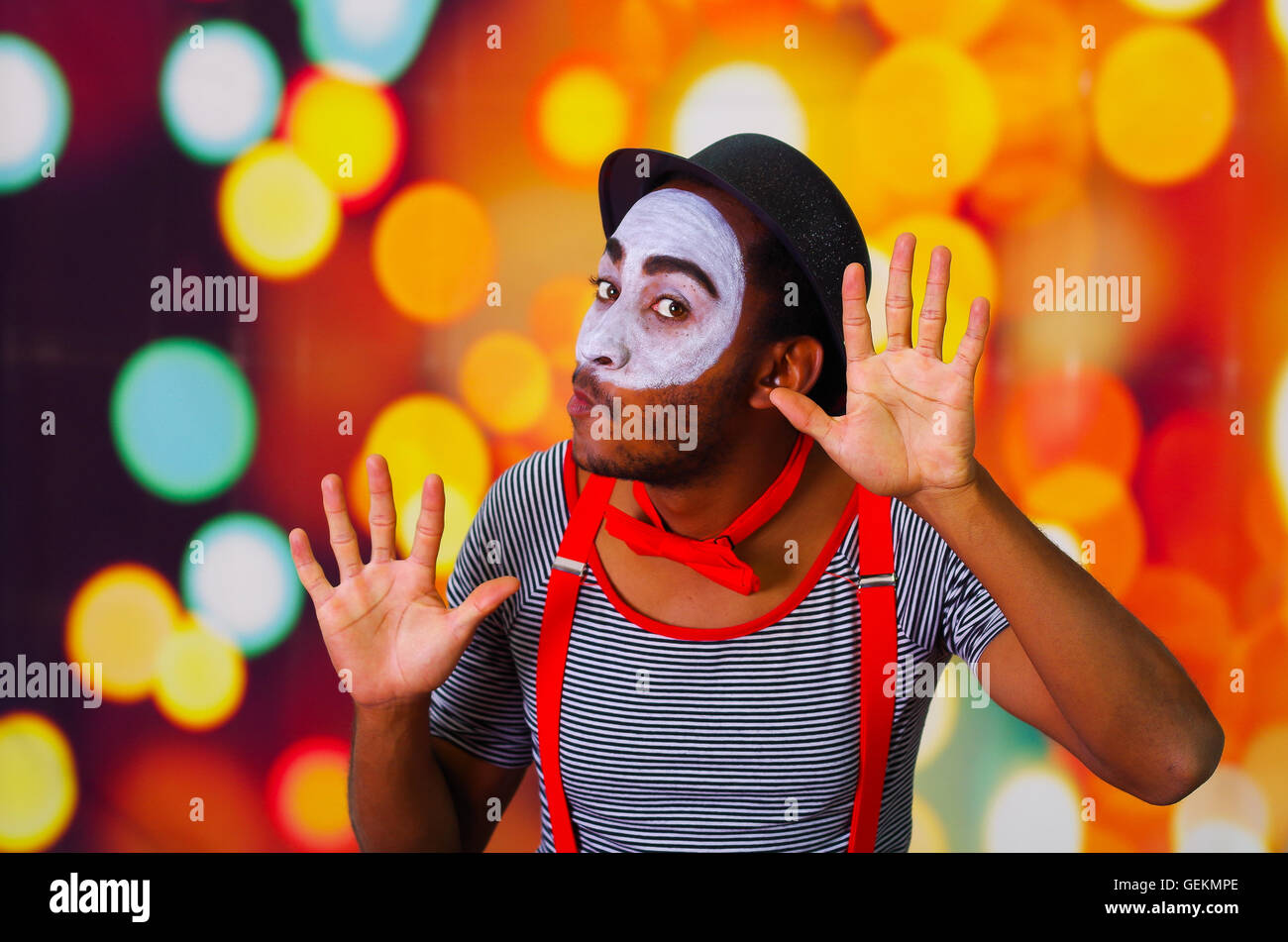 Pantomime man with facial paint posing for camera interacting funny ...