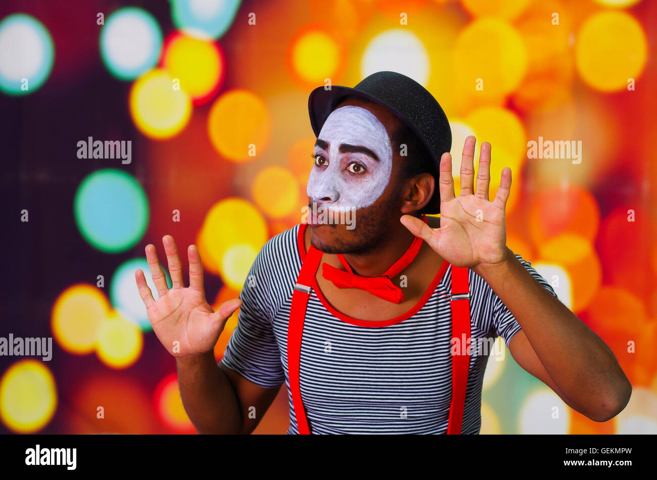 Pantomime man with facial paint posing for camera interacting funny ...