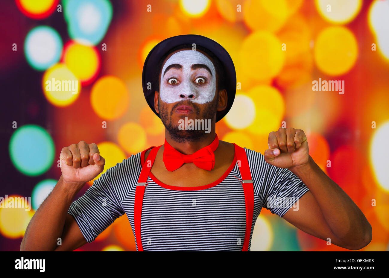 Pantomime man with facial paint posing for camera interacting funny ...