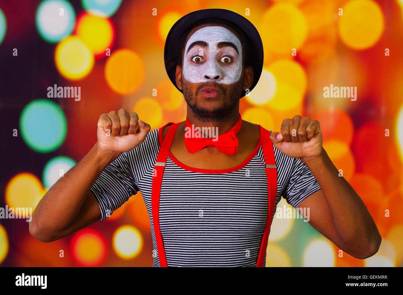 Pantomime man with facial paint posing for camera interacting funny ...