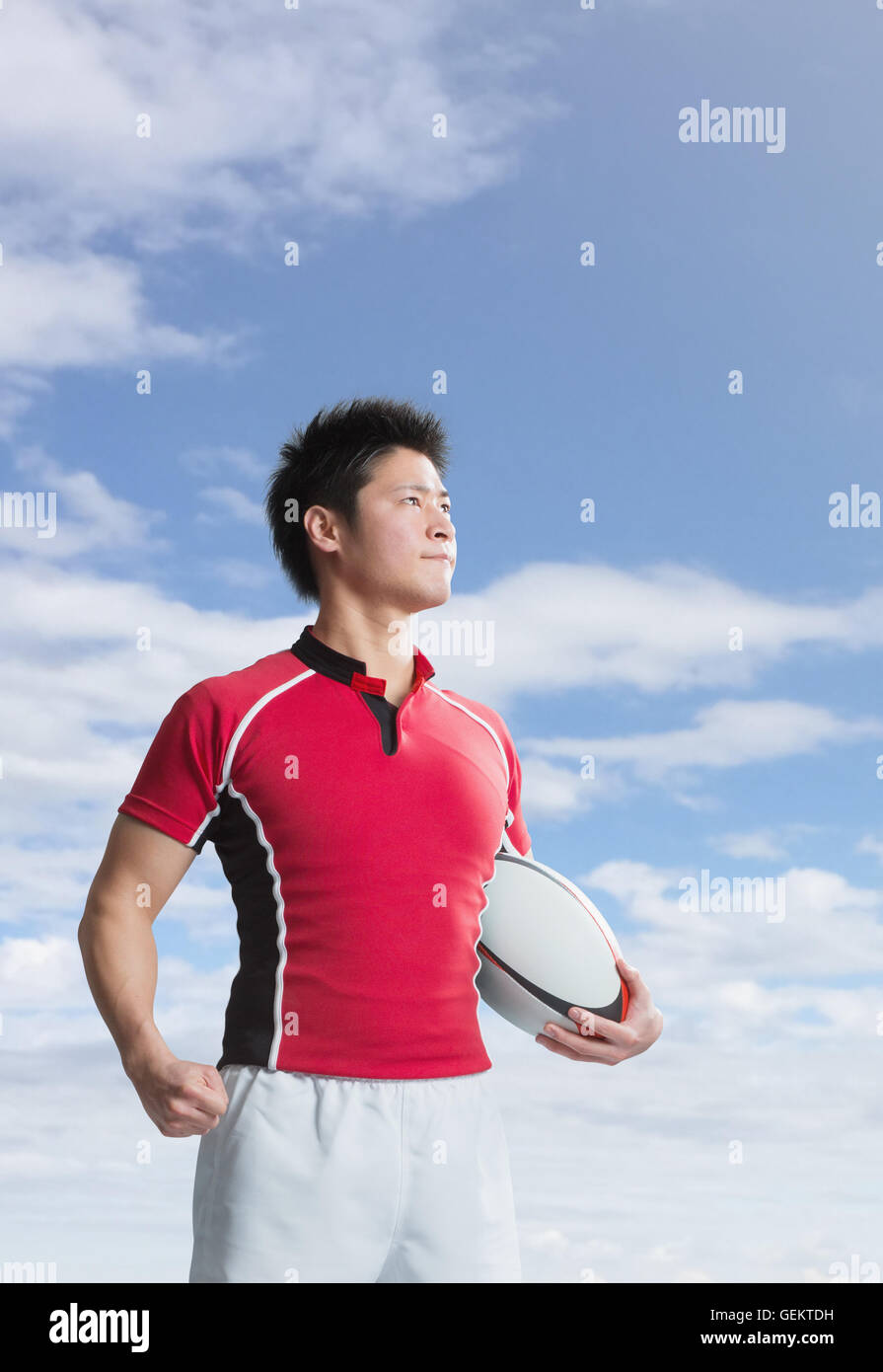Portrait of Japanese rugby player with ball Stock Photo - Alamy