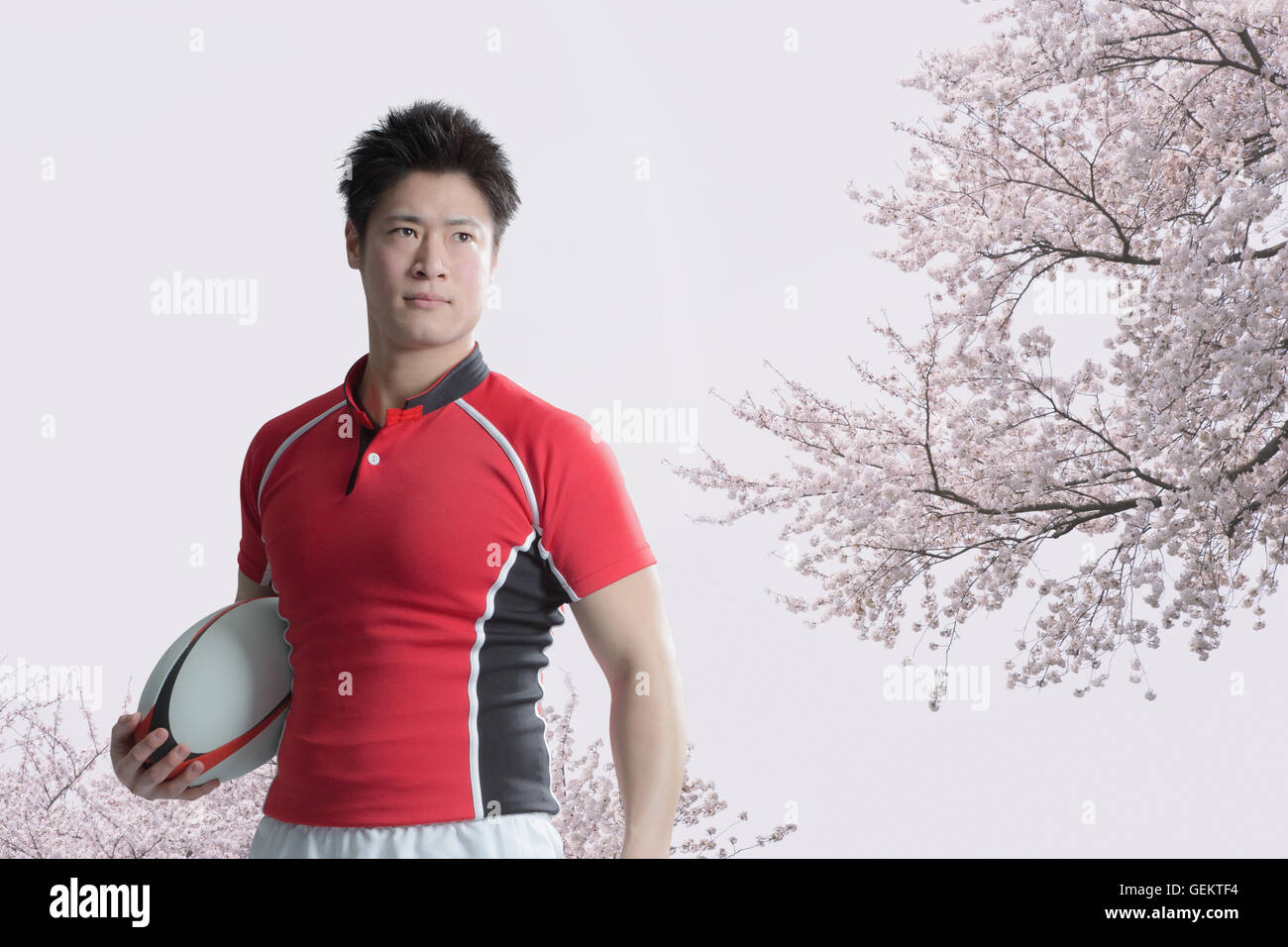 Portrait of Japanese rugby player with ball Stock Photo - Alamy