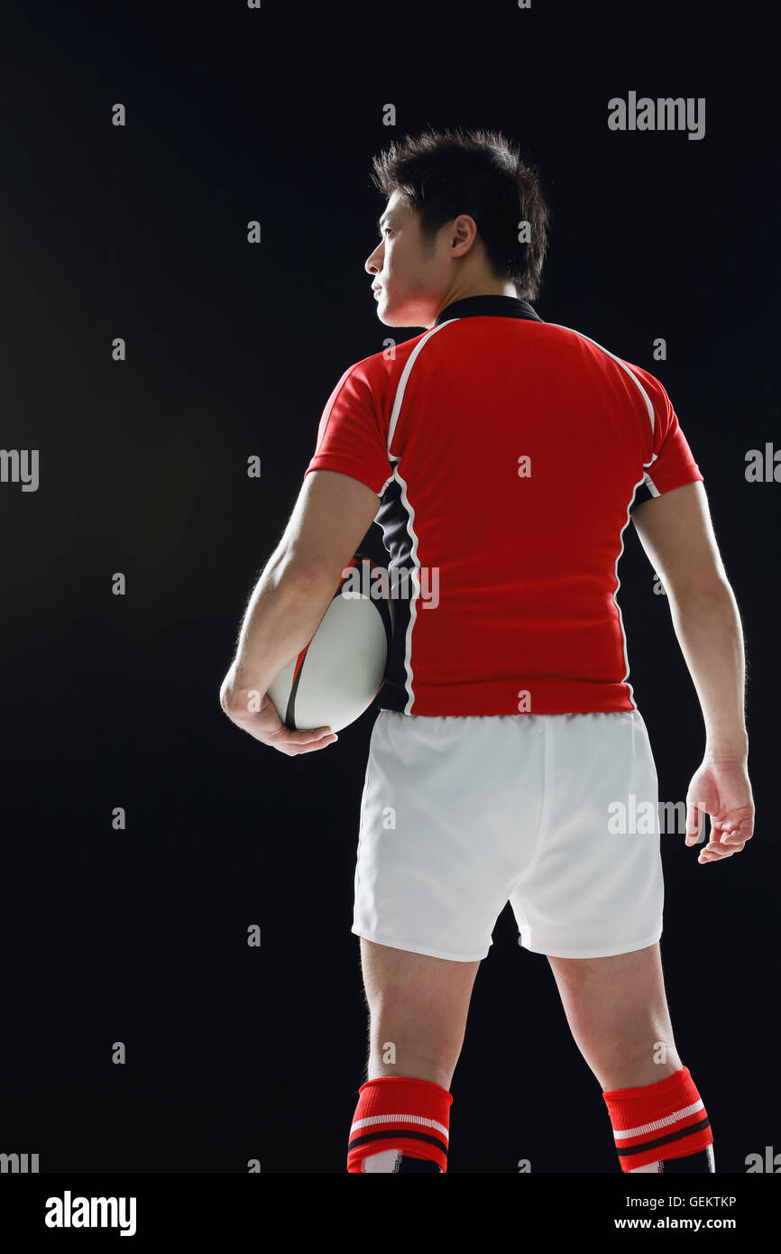 Portrait of Japanese rugby player with ball Stock Photo - Alamy