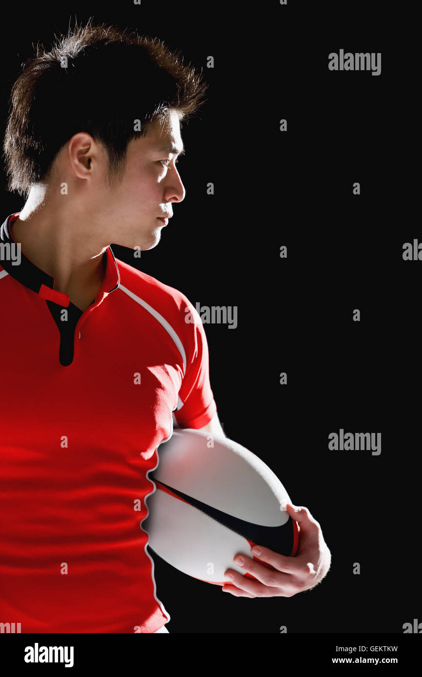 Portrait of Japanese rugby player with ball Stock Photo - Alamy