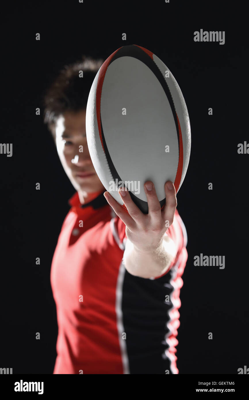 Portrait of Japanese rugby player with ball Stock Photo - Alamy