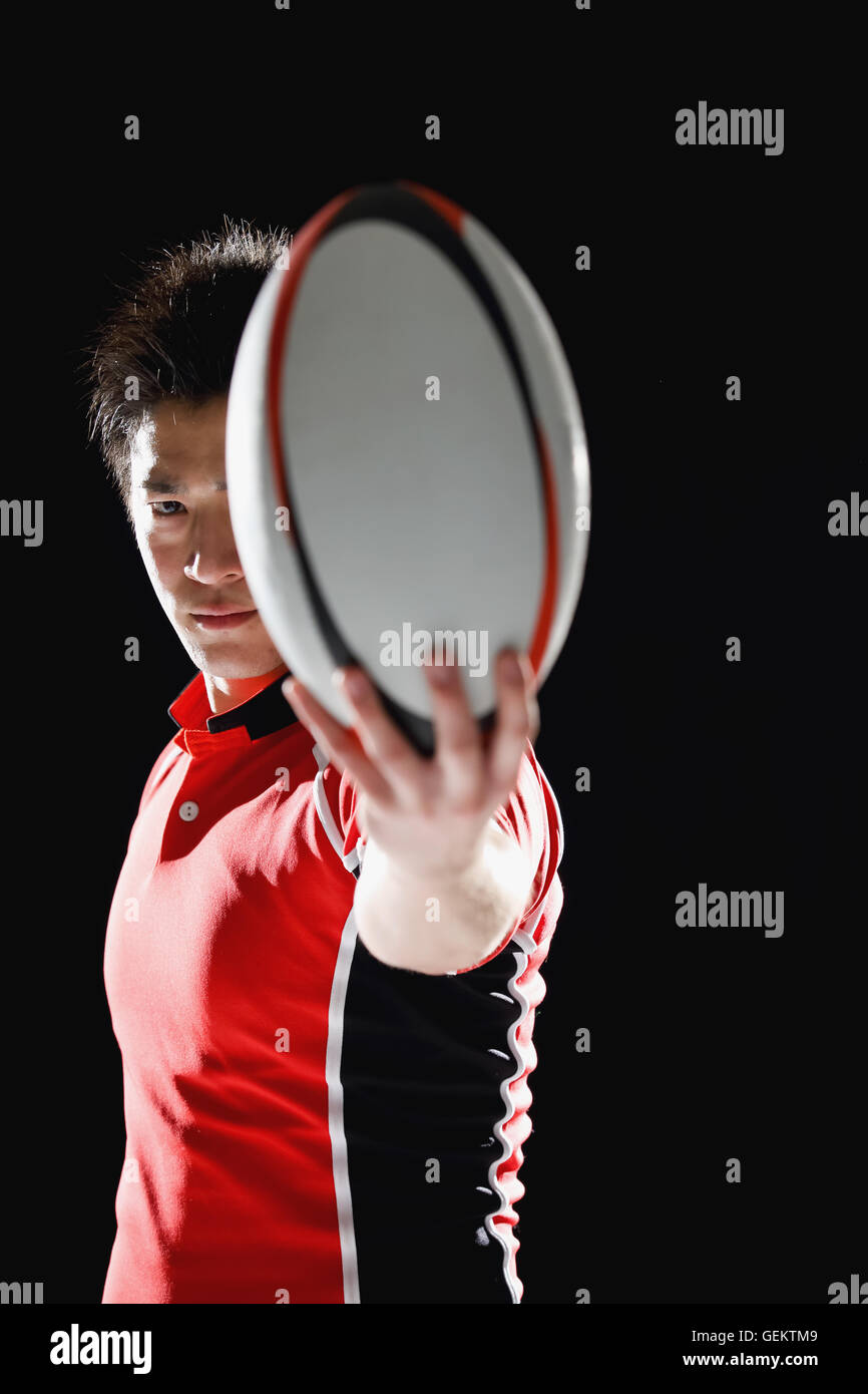 Portrait of Japanese rugby player with ball Stock Photo - Alamy