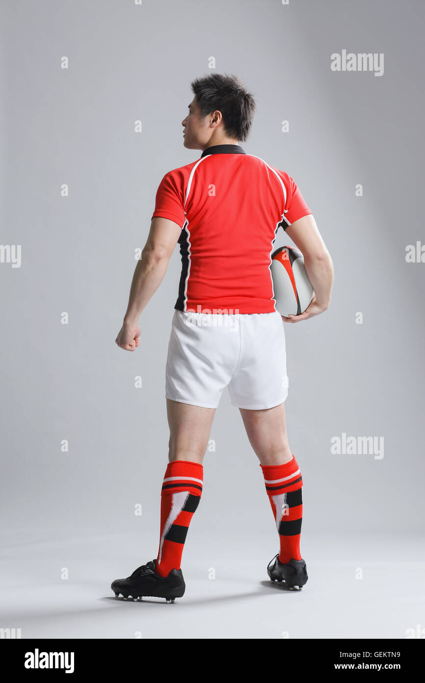 Portrait of Japanese rugby player with ball Stock Photo - Alamy