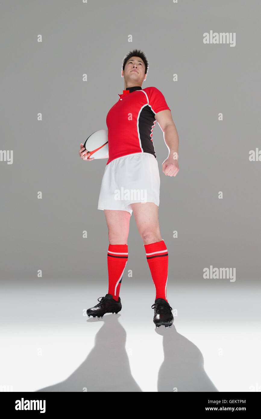 Portrait of Japanese rugby player with ball Stock Photo - Alamy
