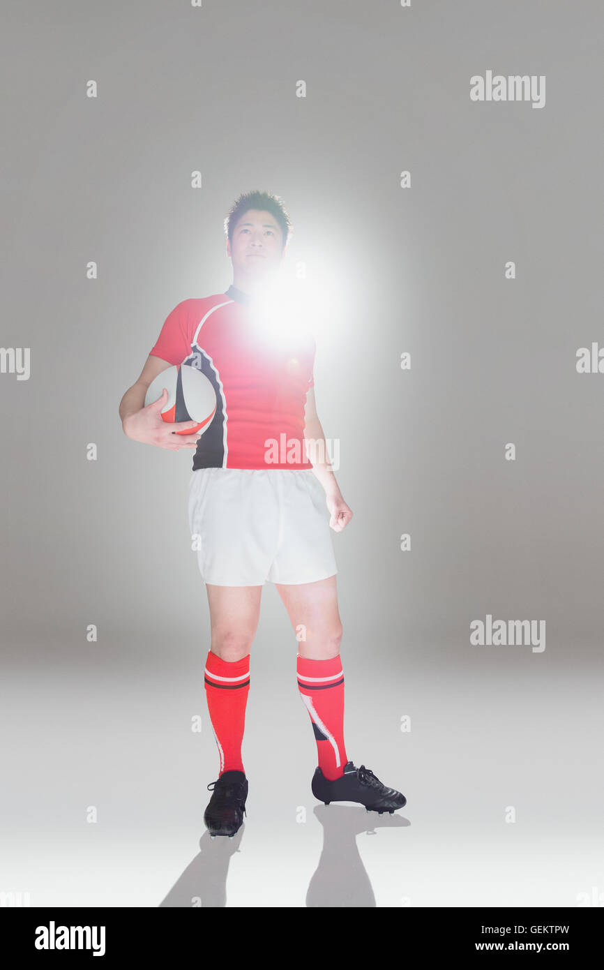 Portrait of Japanese rugby player with ball Stock Photo - Alamy