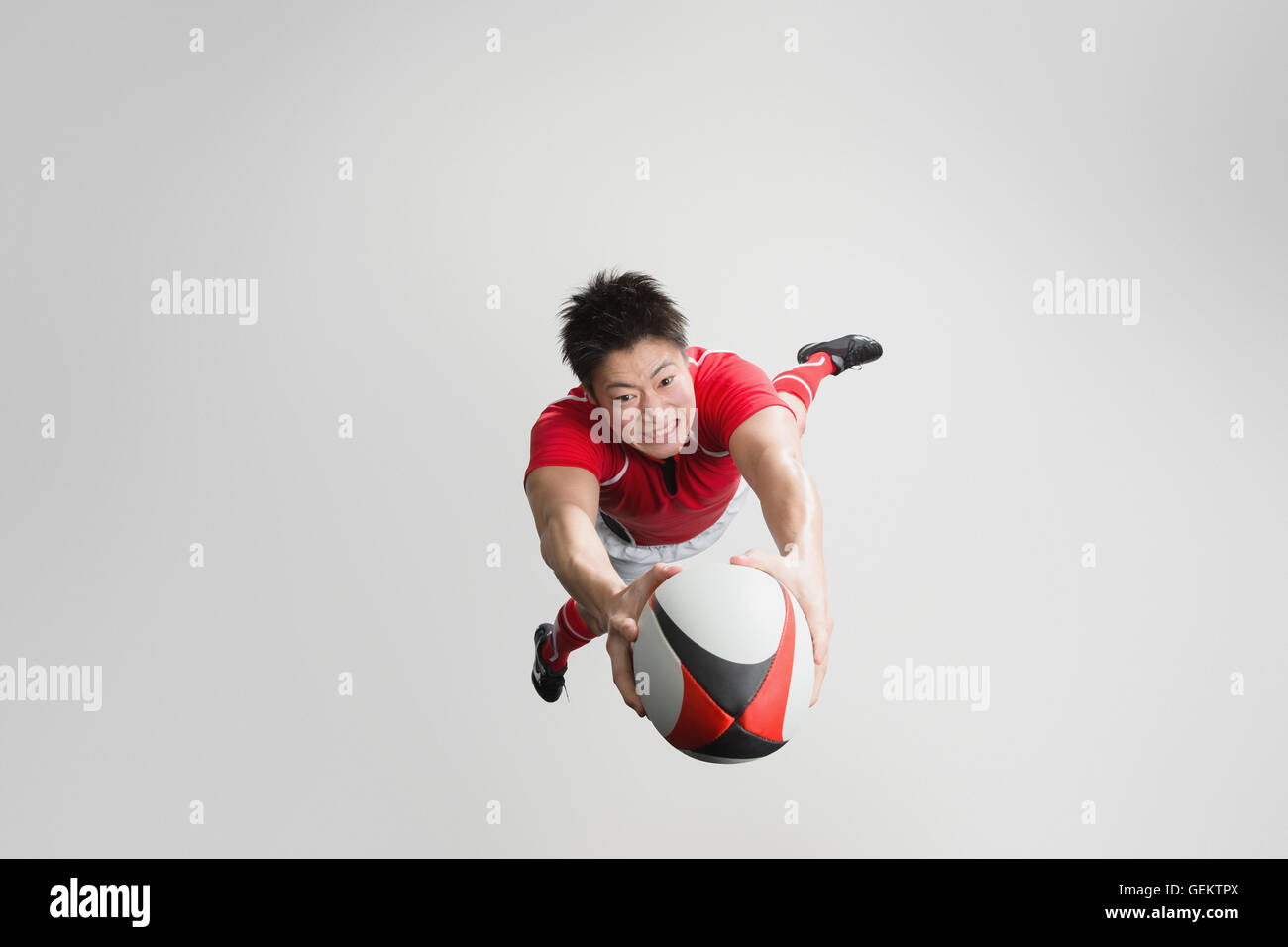 Portrait of Japanese rugby player diving to score a try Stock Photo - Alamy