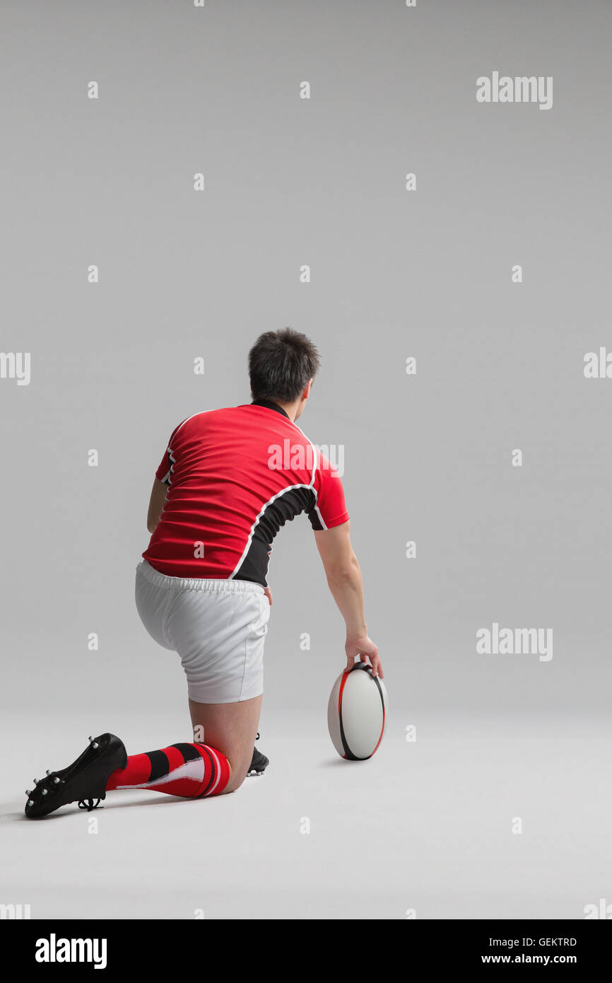 Portrait of Japanese rugby player with ball Stock Photo - Alamy