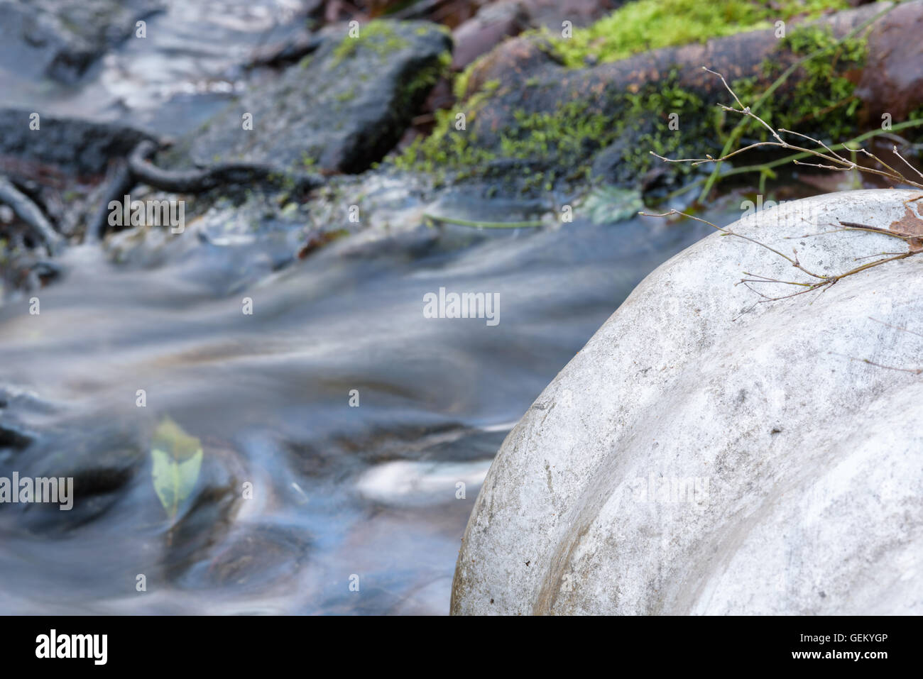 Close-up of concrete culvert with water flowing out Stock Photo - Alamy